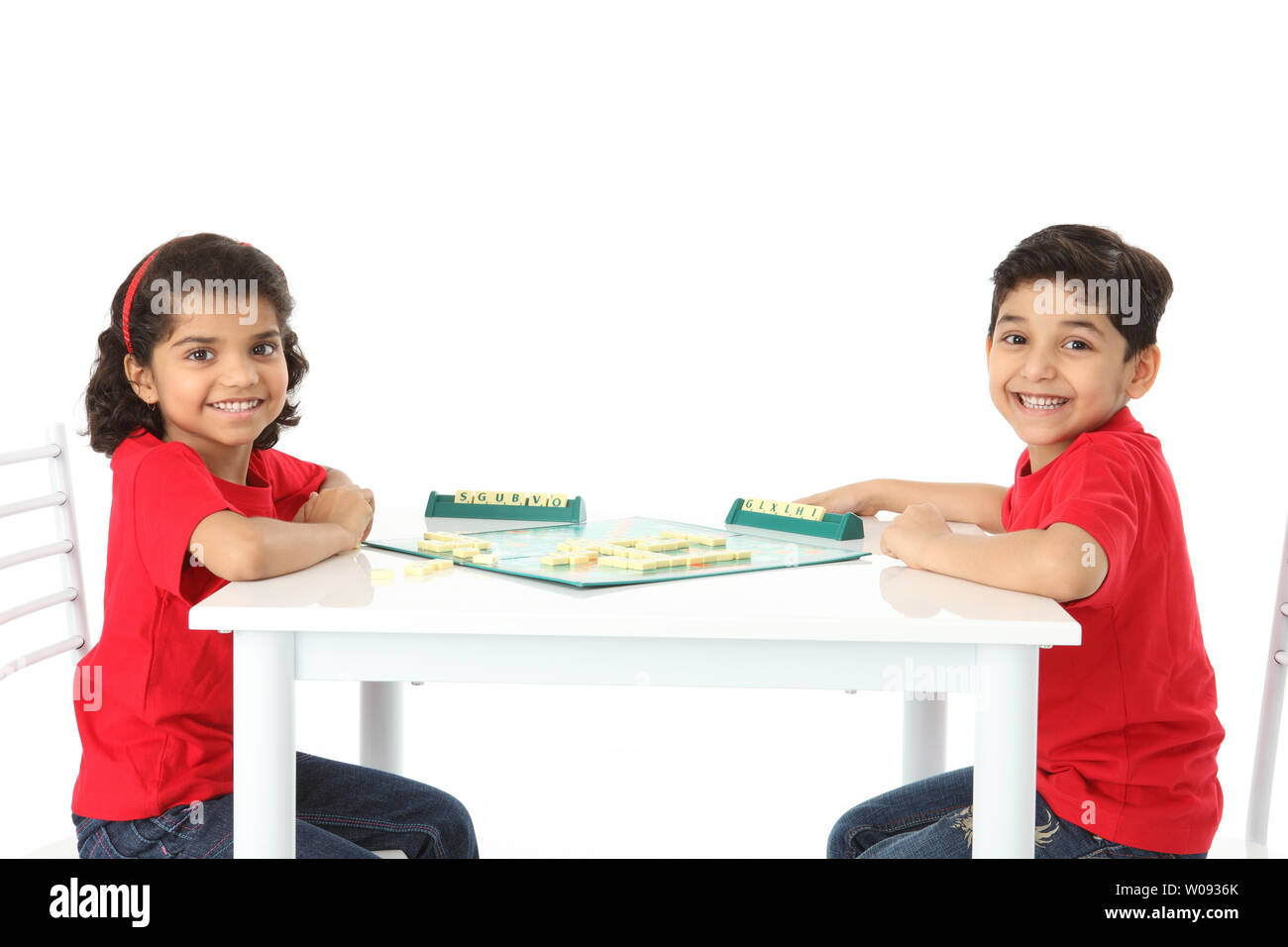 Two friends playing word game Stock Photo - Alamy