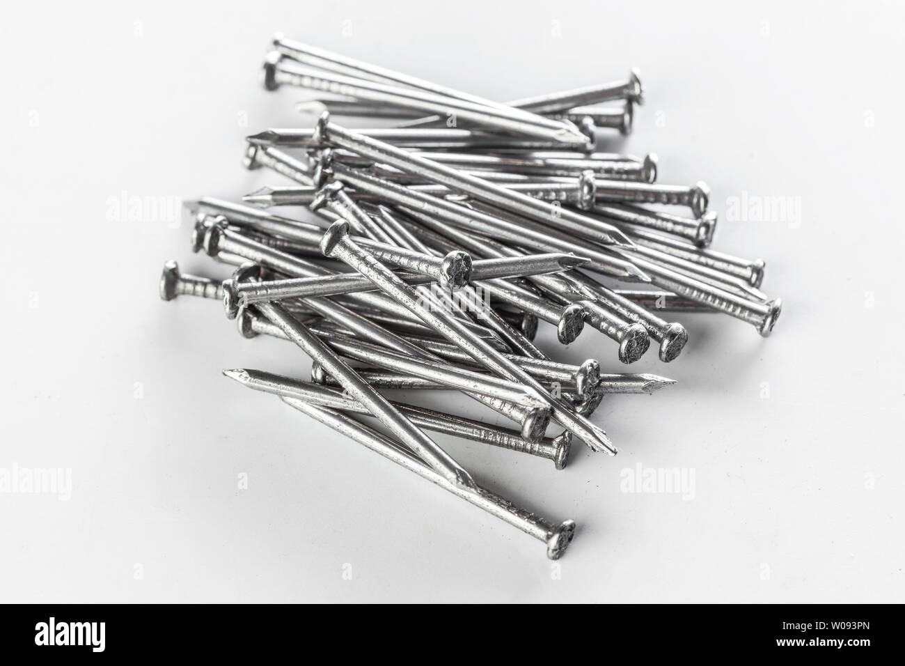 nail isolated on white Stock Photo - Alamy