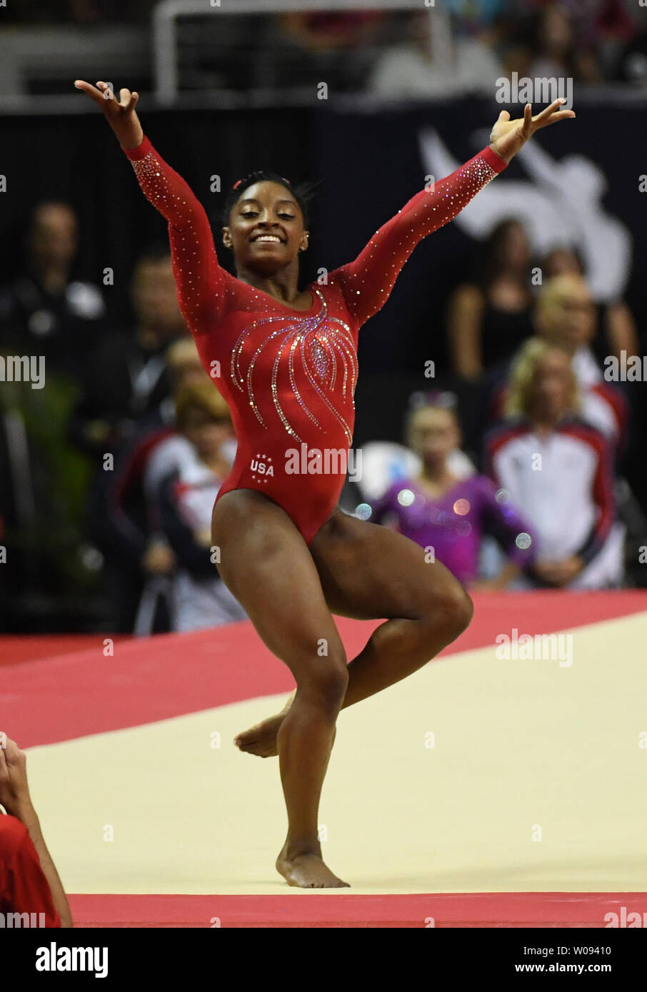 Simone Biles performs in the floor exercise at the Women's Olympic ...