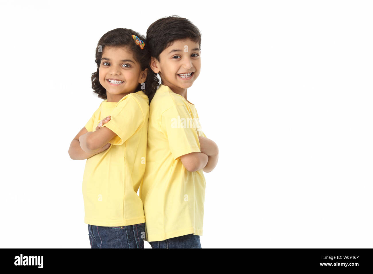 Portrait of two Indian friends smiling with their arms crossed Stock ...