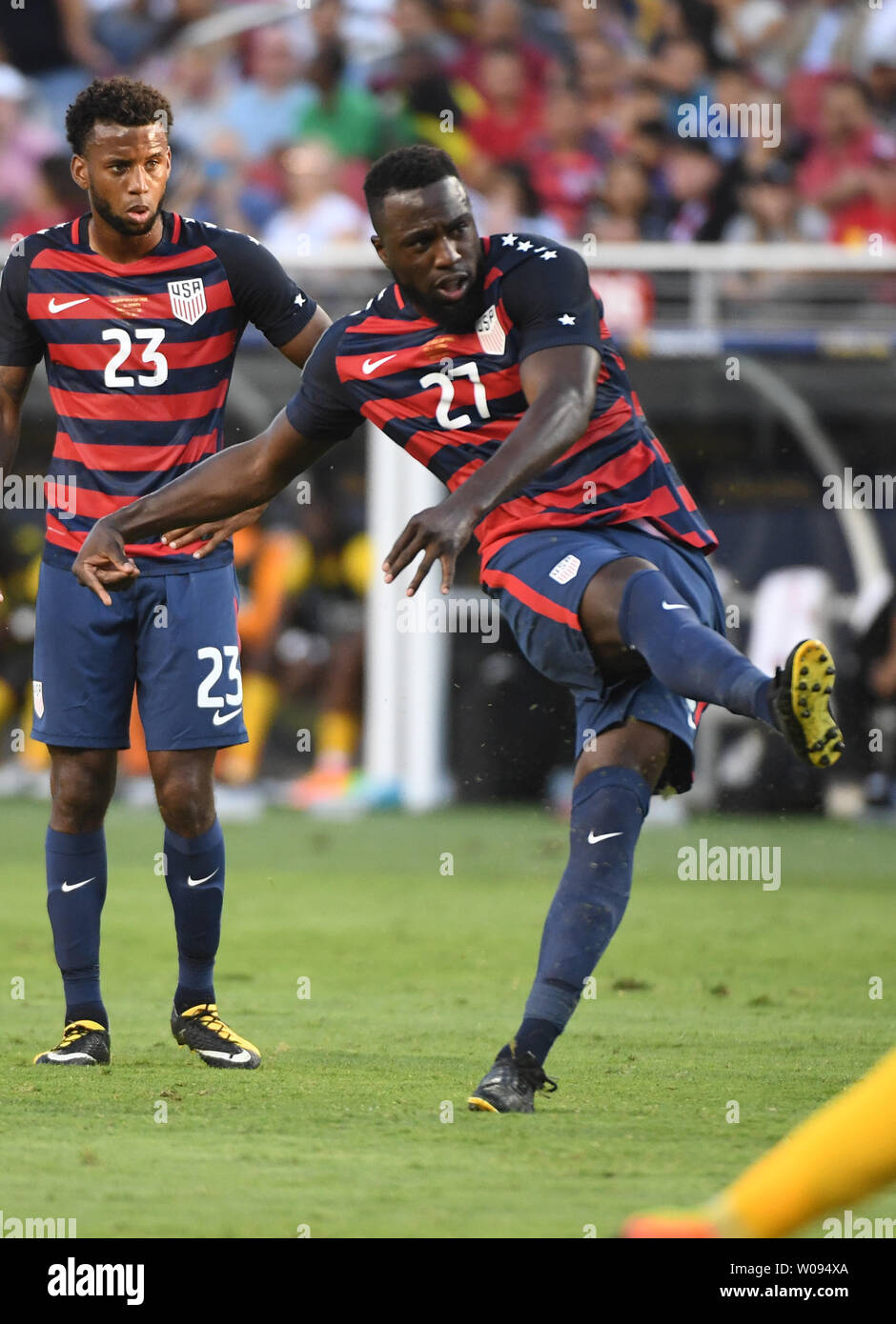 USA's Matt Hedges (27) kicks a goal against Jamaica in the first half ...