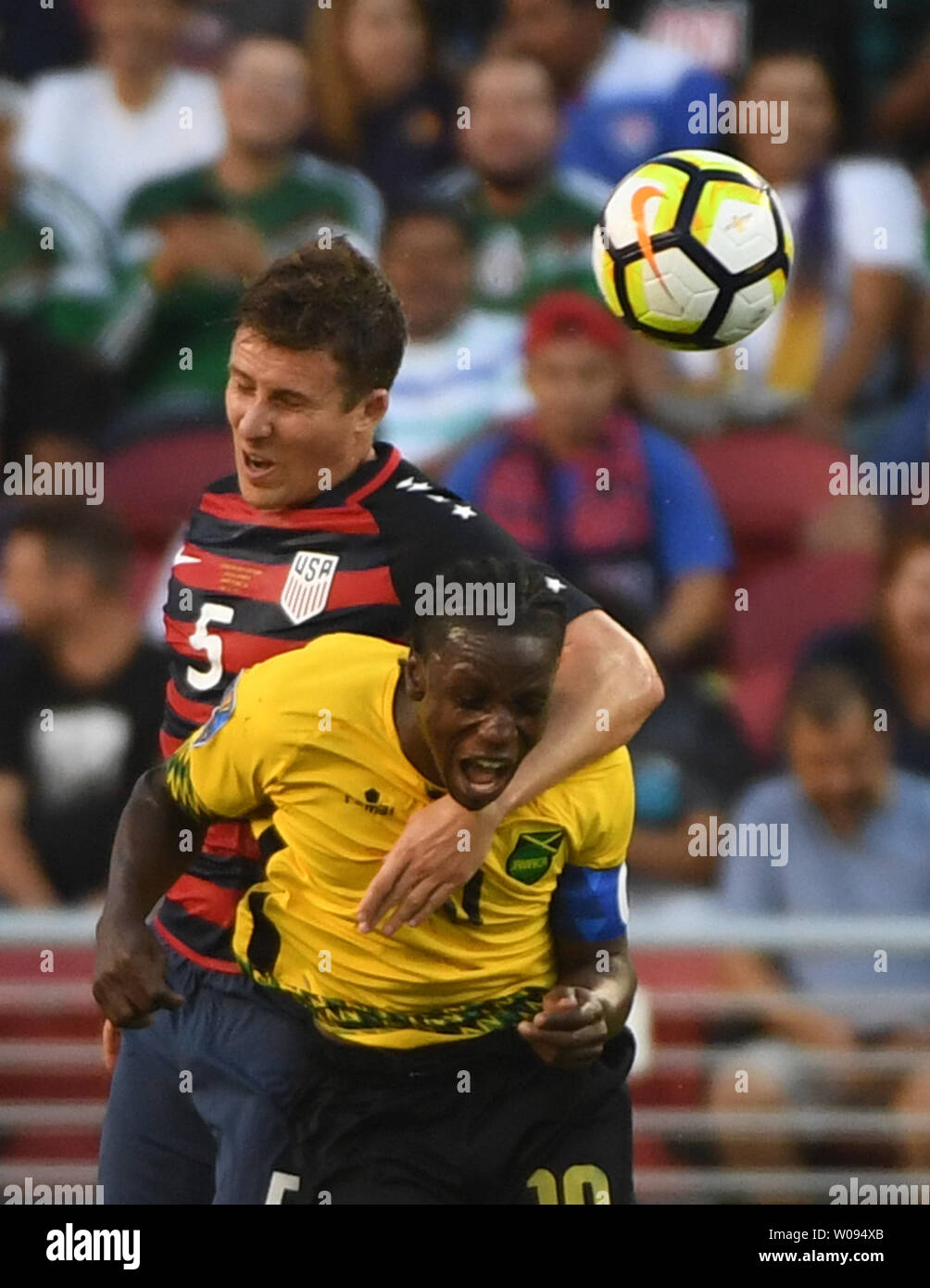 USA's Matt Bressler (L) and Jamaica's Darren Mattocks (10) fight for ...