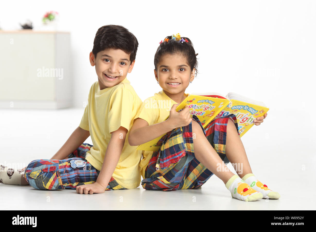 Portrait of two children smiling Stock Photo - Alamy