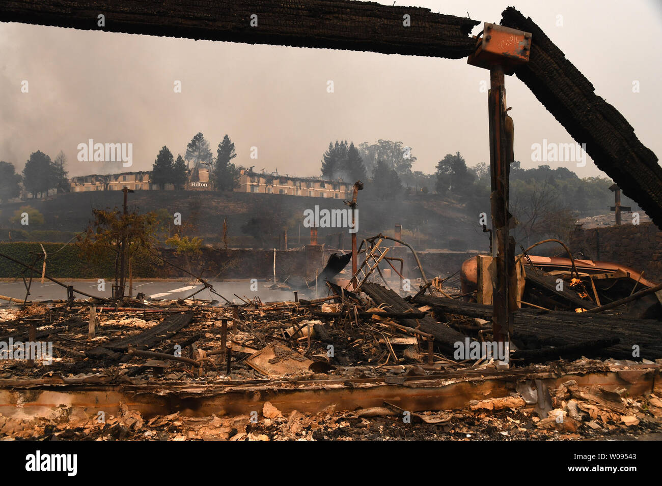 The Hilton Hotel lies in ruins and still smoldering as wildfires fueled ...