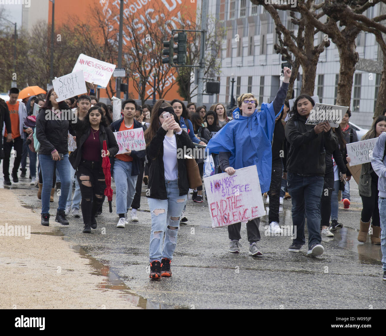 Students walking out of High School march to a demonstration at City ...