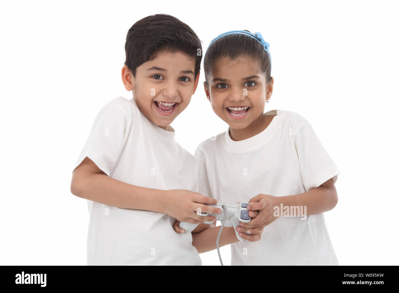 Friends playing video game indian hi-res stock photography and images ...