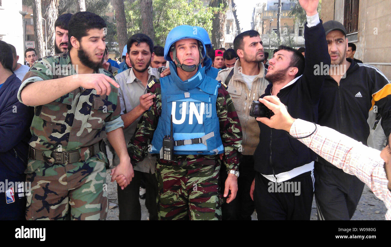 Syrian Abdul Razzaq Tlas (L),leader of the opposition Katibat al-Faruq ...