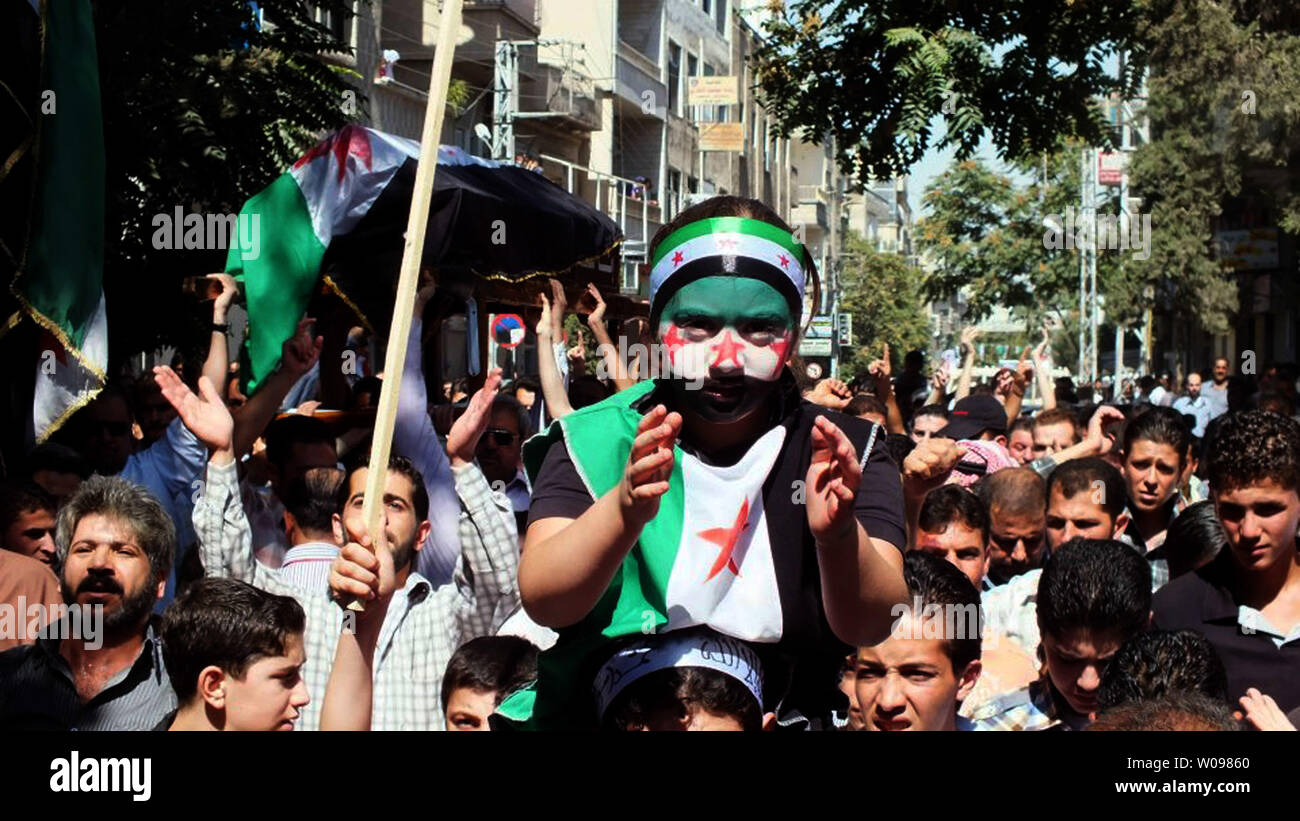 Carry a body in syria hi-res stock photography and images - Alamy