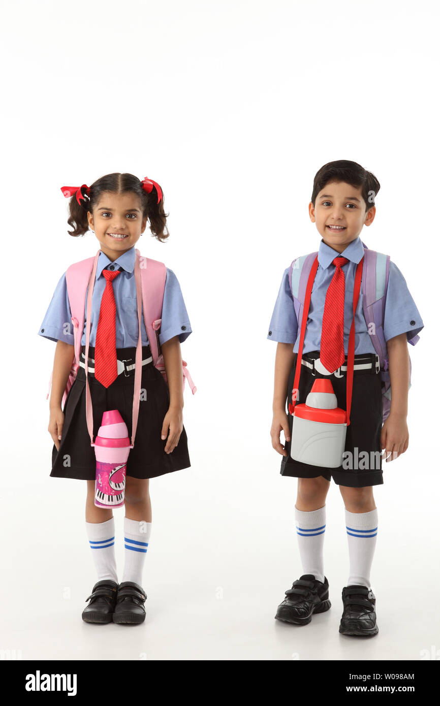 Portrait of two school children smiling Stock Photo - Alamy