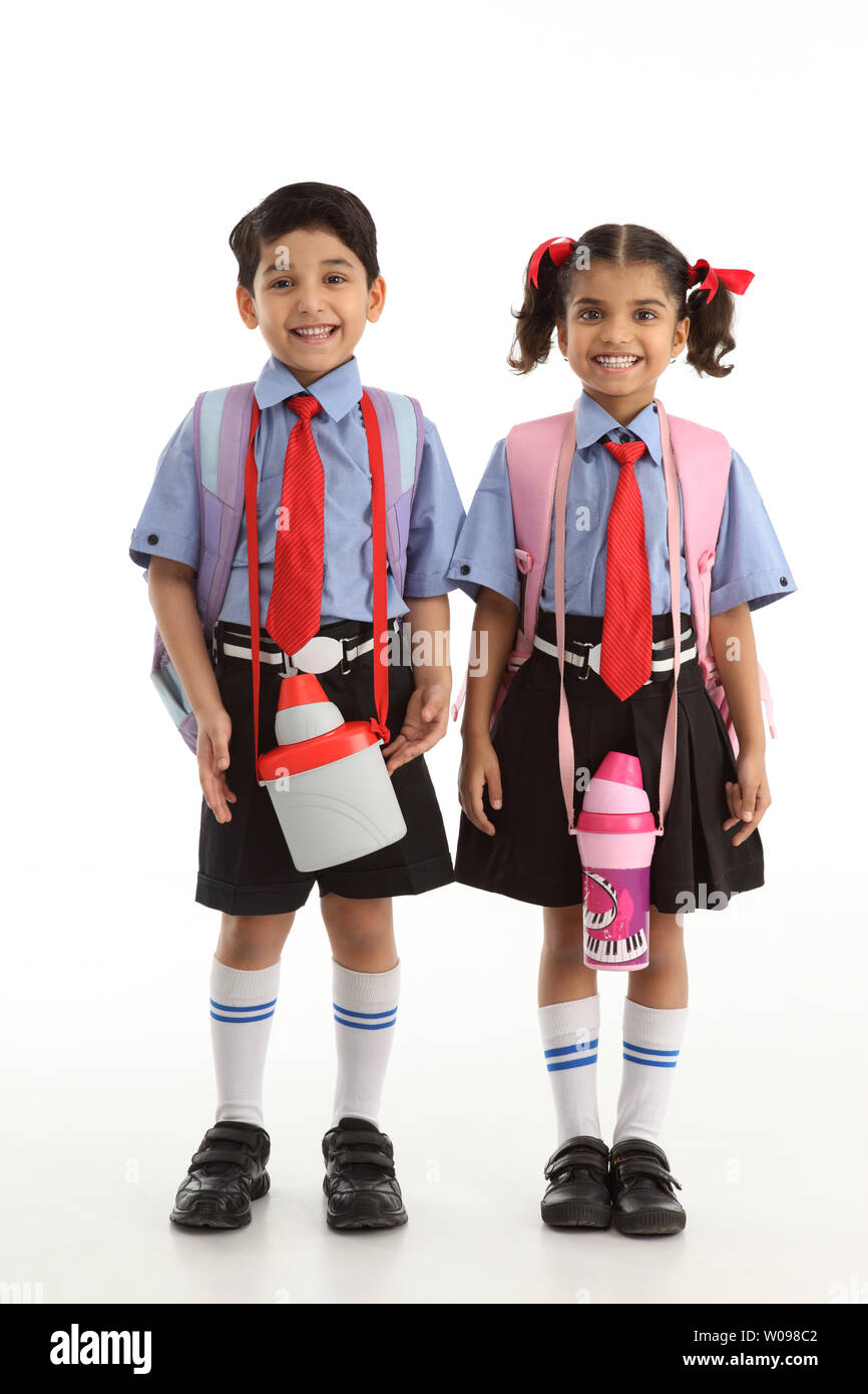 Portrait of two school children smiling Stock Photo - Alamy