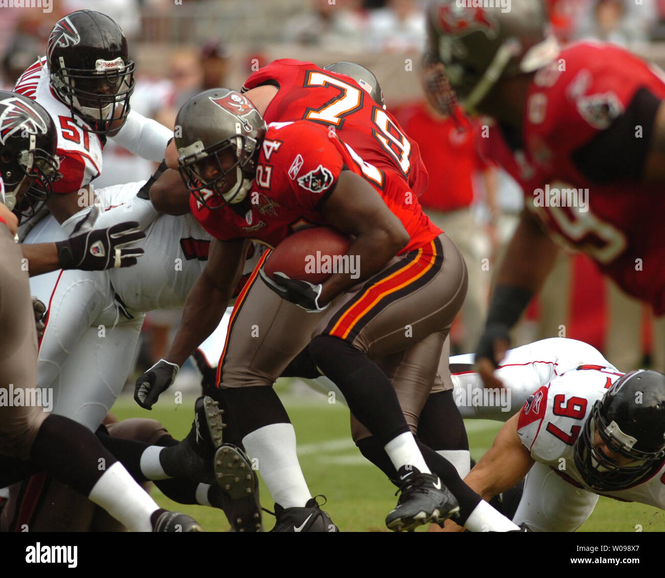 Tampa Bay Buccaneers' Carnell "Cadillac" Williams (24) maneuvers his ...