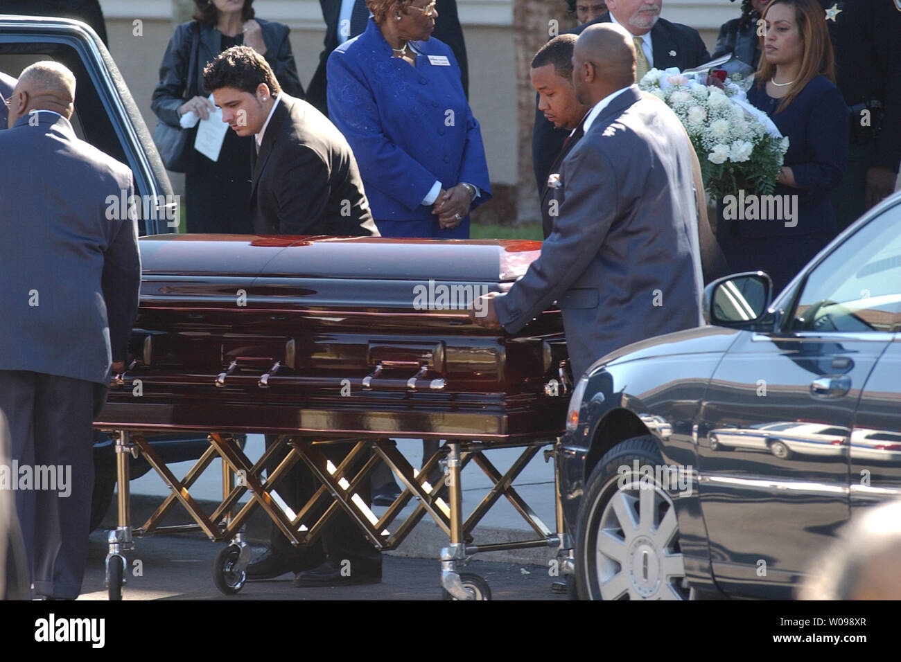 James Dungy's casket is wheeled out of Idlewild Baptist Church December ...