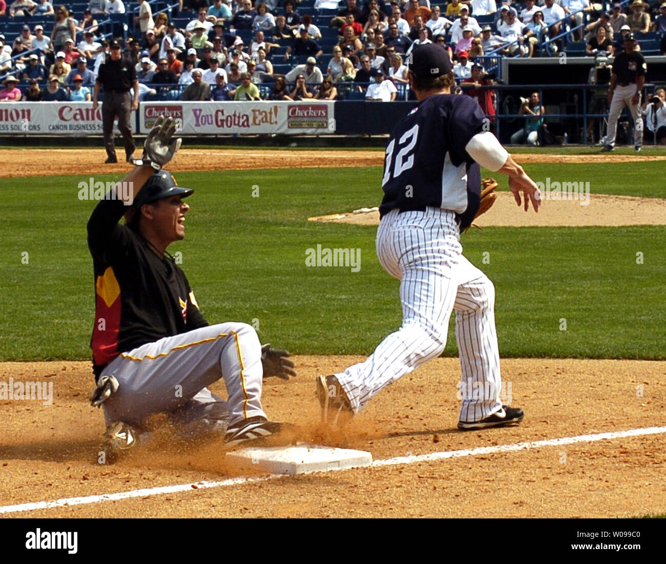 Pittsburgh Pirates' Luis Cruz (80) is out at third base by New York ...
