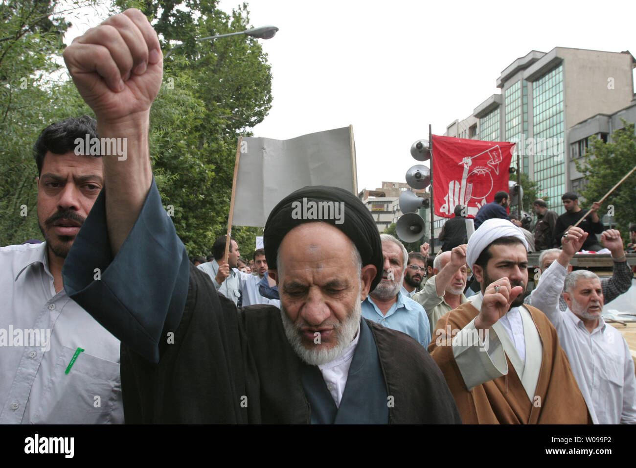 Iranian cleric men chant slogans during an anti-USA rally to condemn ...