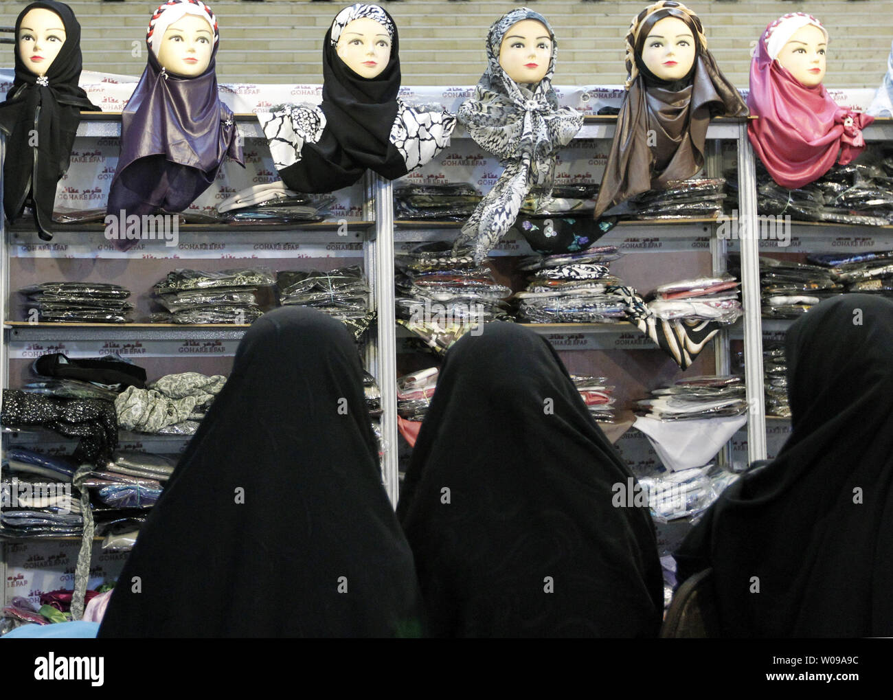 Iranian women shop for scarves during International Koran Exhibition at ...