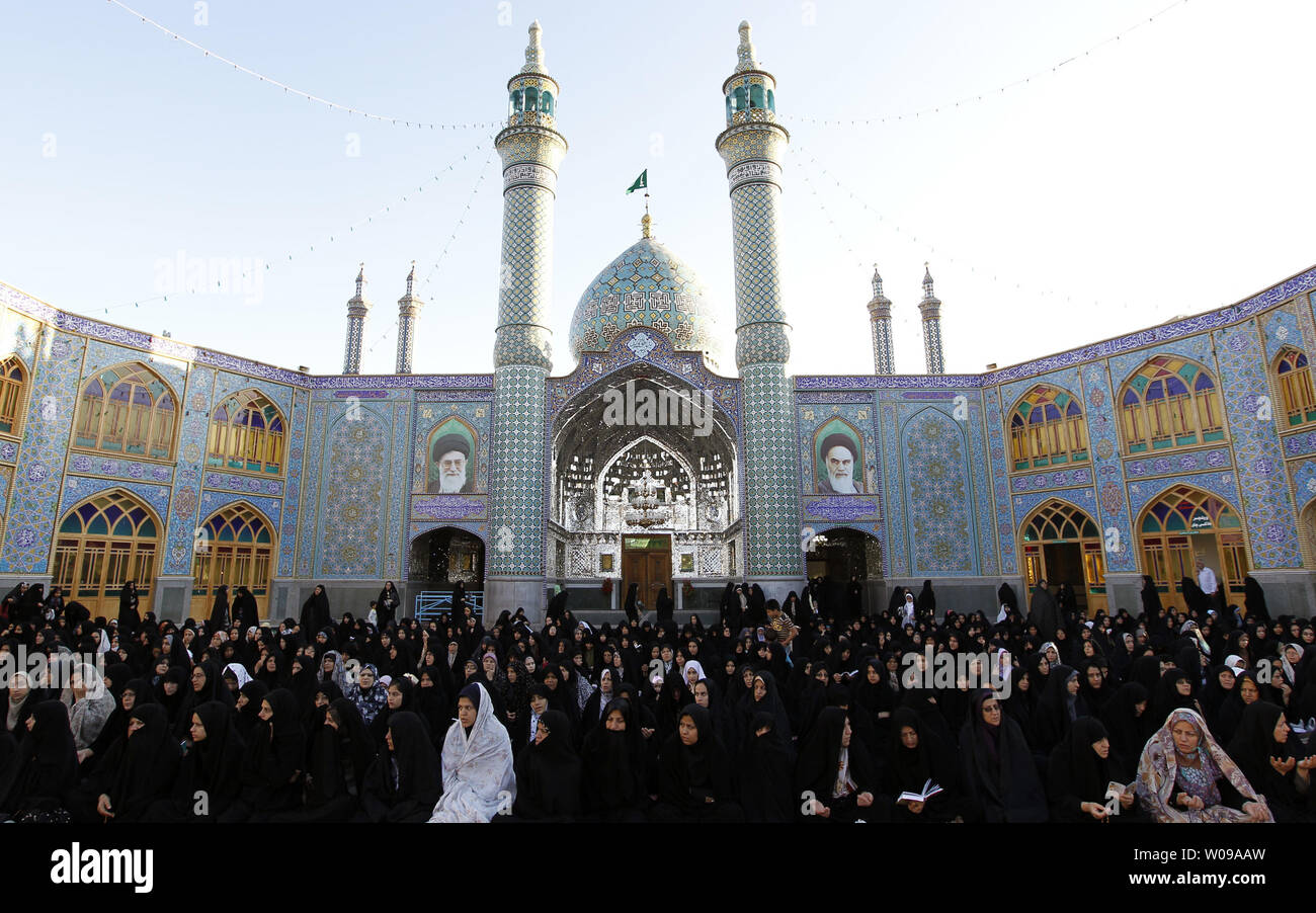 Iranian women pray at Imam zadeh Helal Ebne Ali shrine in Aran o BidGol ...