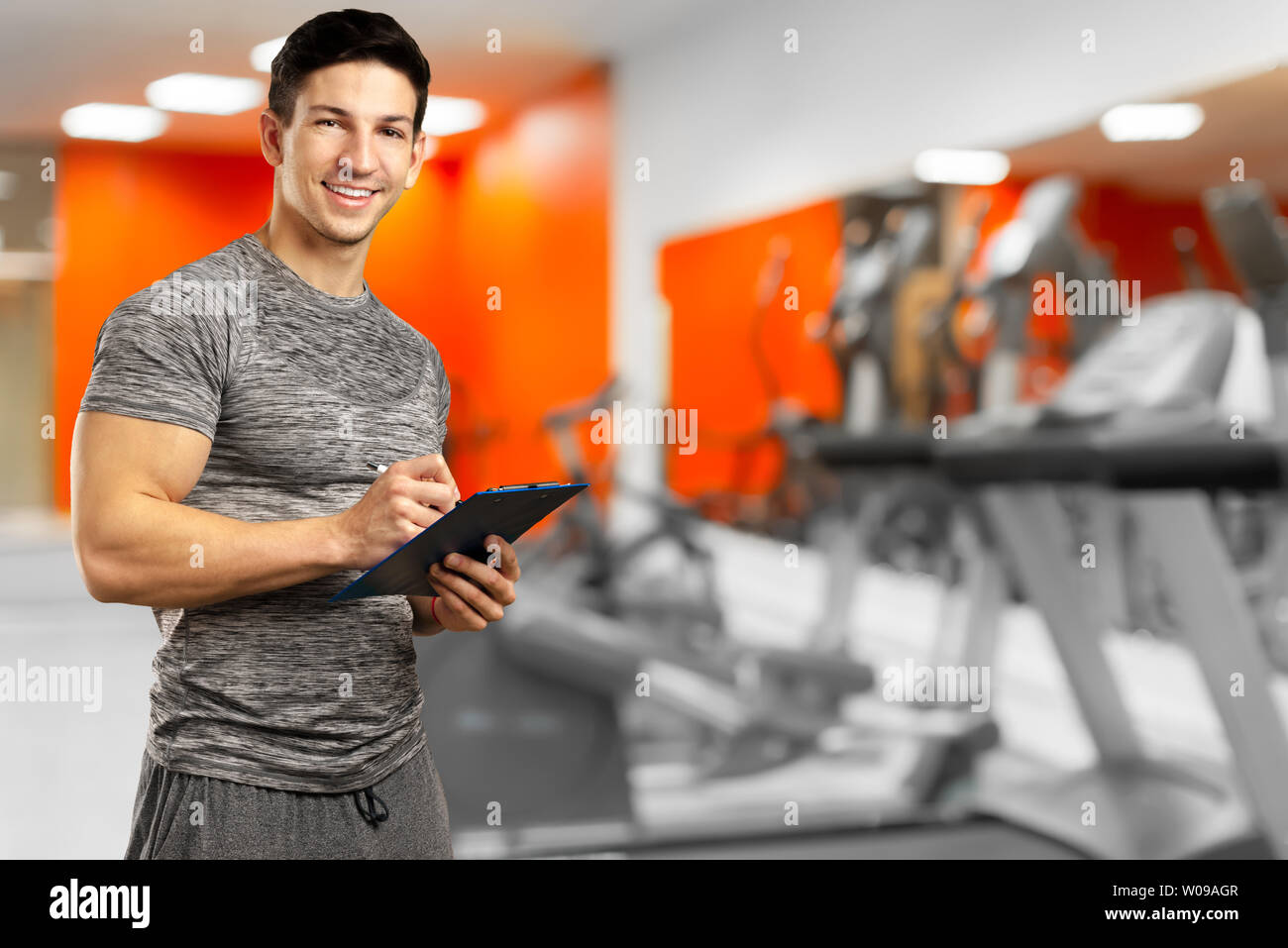 strong personal trainer Stock Photo - Alamy