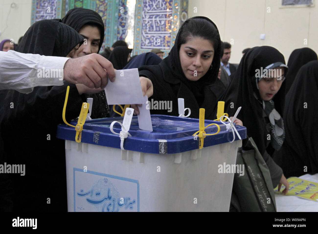 Iranians cast the votes at a polling station in Tehran, Iran on March 2 ...