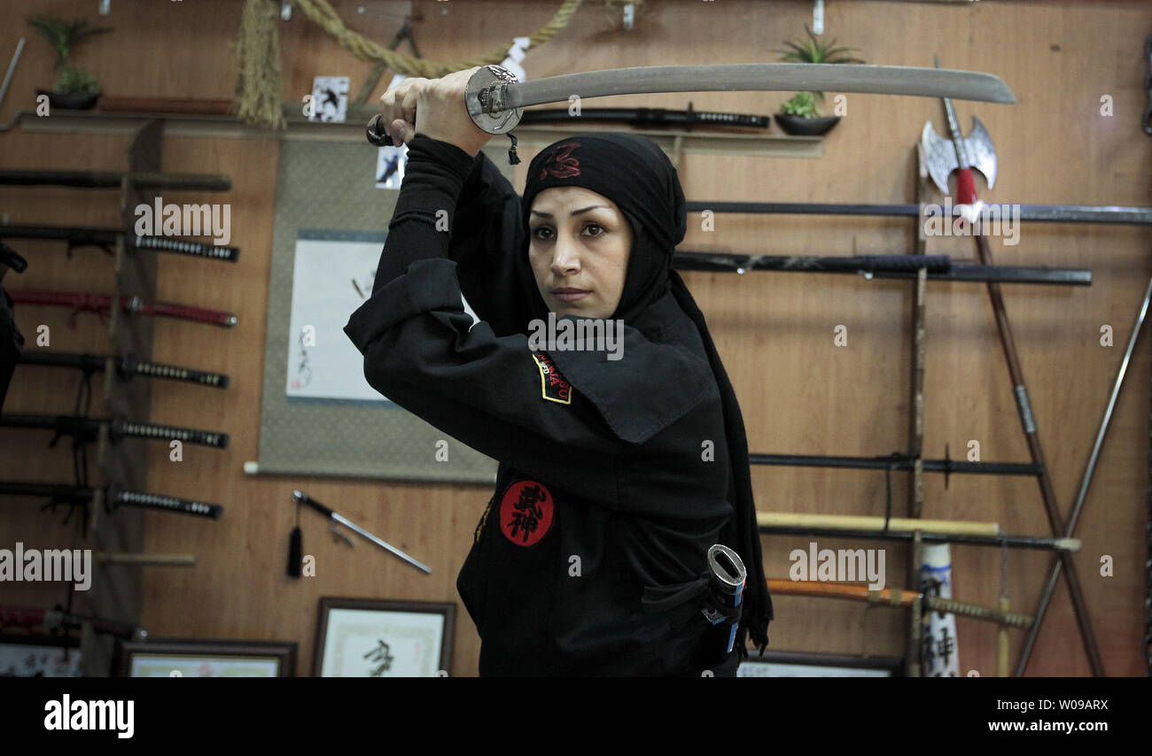 An Iranian Ninjutsu woman practices at her gym in Karaj, 45 km (28 ...