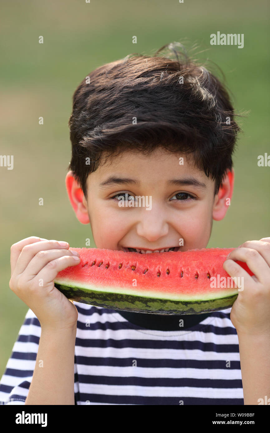 Eating watermelon slice hi-res stock photography and images - Alamy