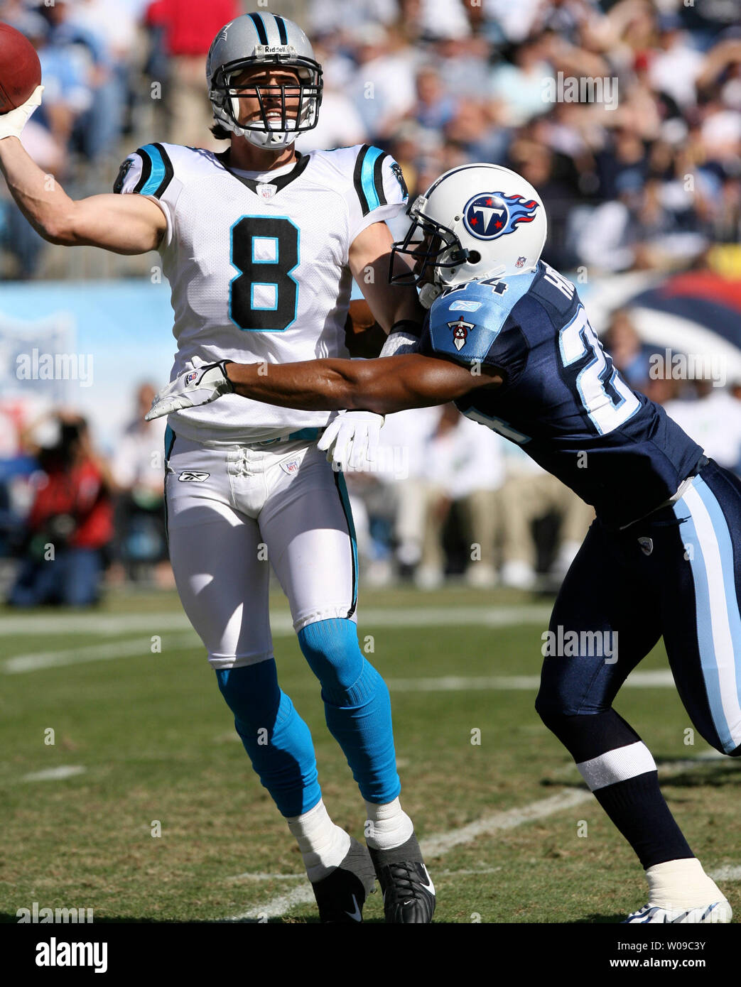 Carolina Panther quarterback David Carr (8) passes the ball as he's pressured by Tennessee ...