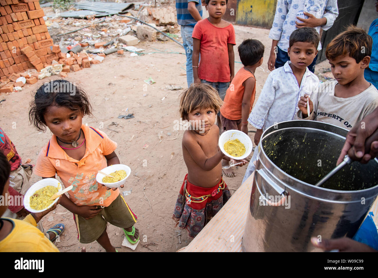 Children Feeding The Poor