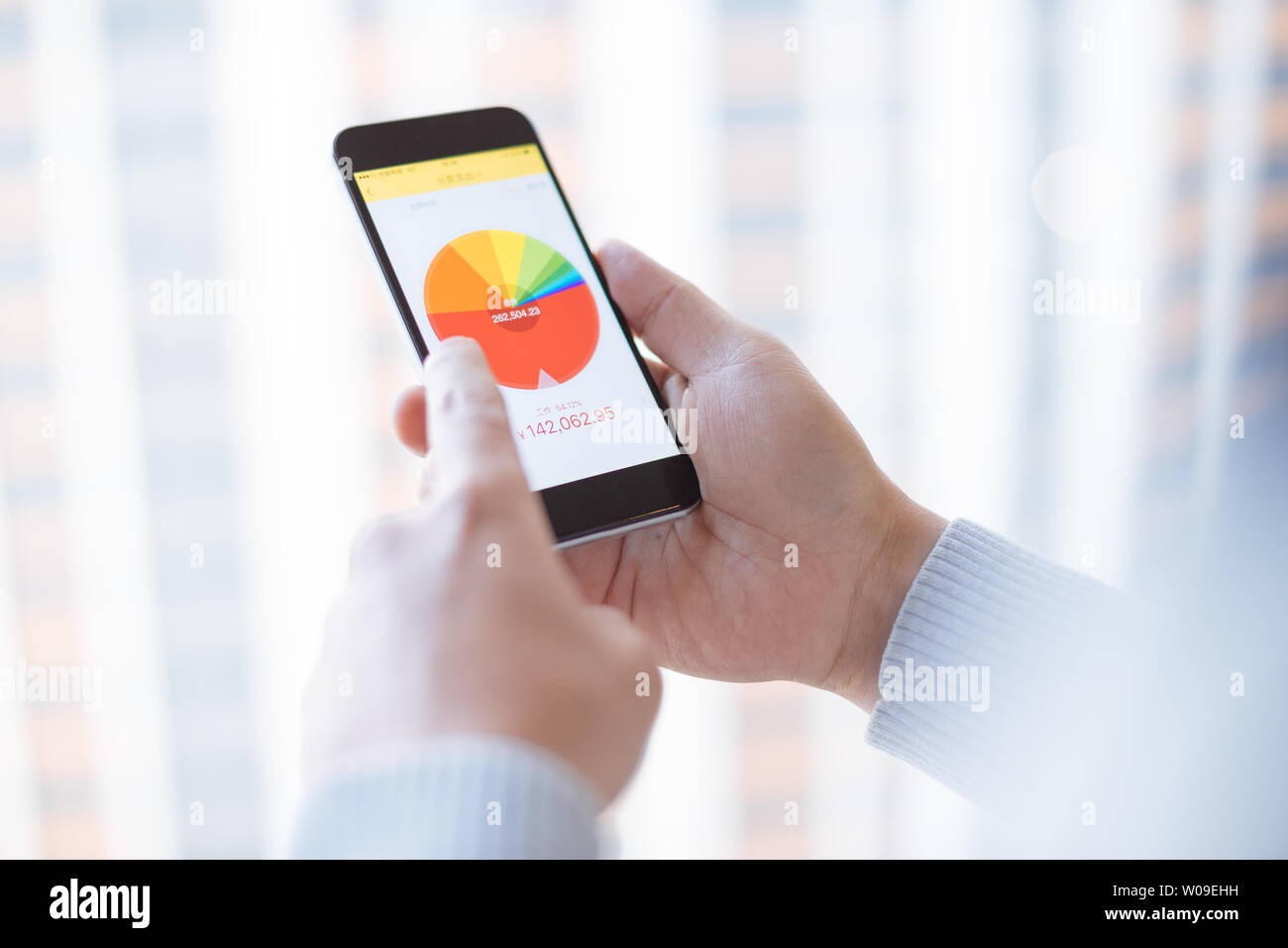 Mobile phone in man's hand Stock Photo - Alamy