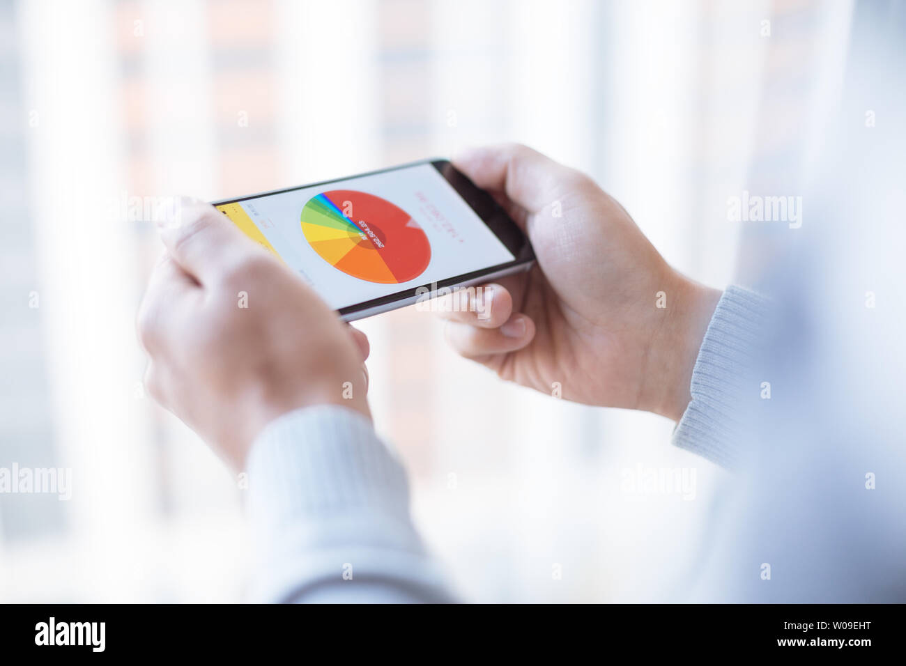Mobile phone in man's hand Stock Photo - Alamy