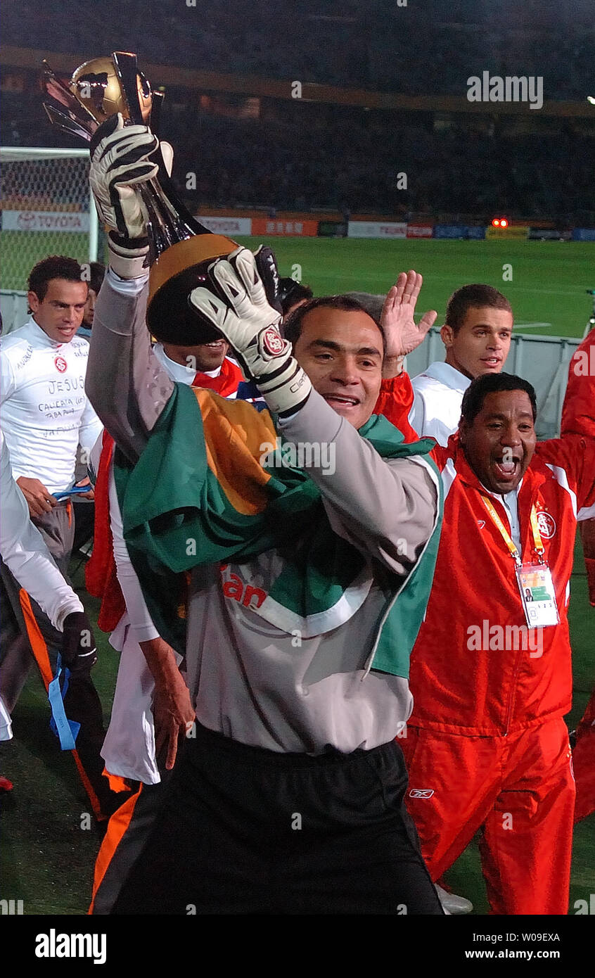 Clemer Of Brazil s SC International Holds The Champion Trophy During clemer-of-brazil-s-sc-international-holds-the-champion-trophy-during
