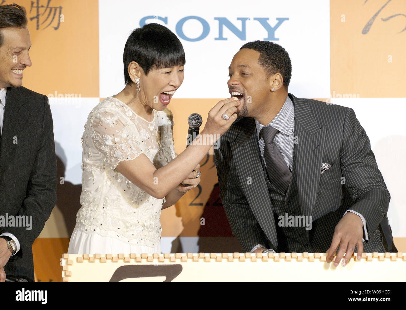 Japanese Jazz singer Akiko Wada (L) help eat chocolate to actor Will ...
