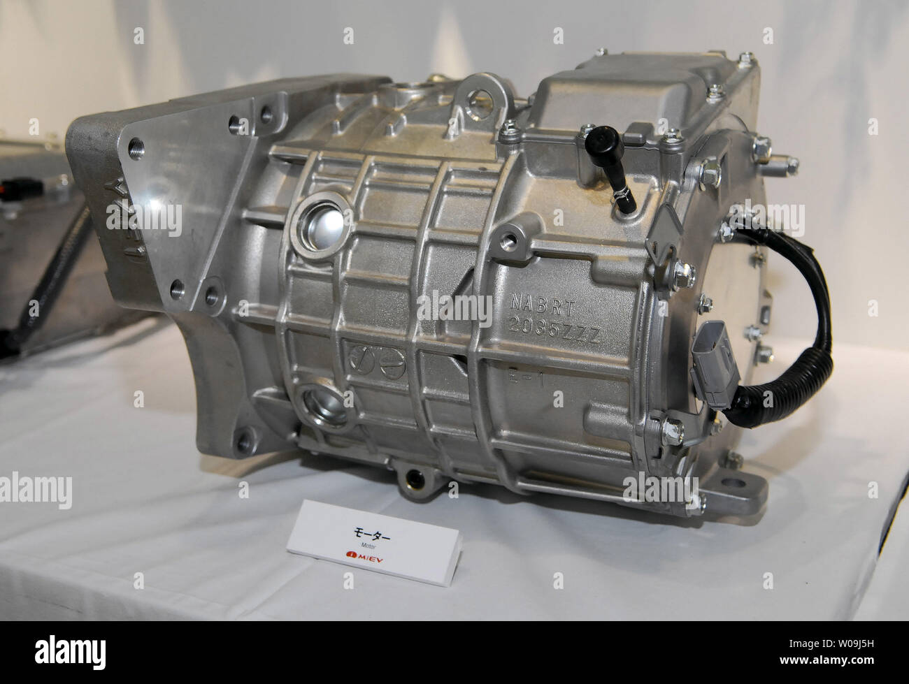 The i-MiEV's motor is displayed during an unveiling at the Mitsubishi ...