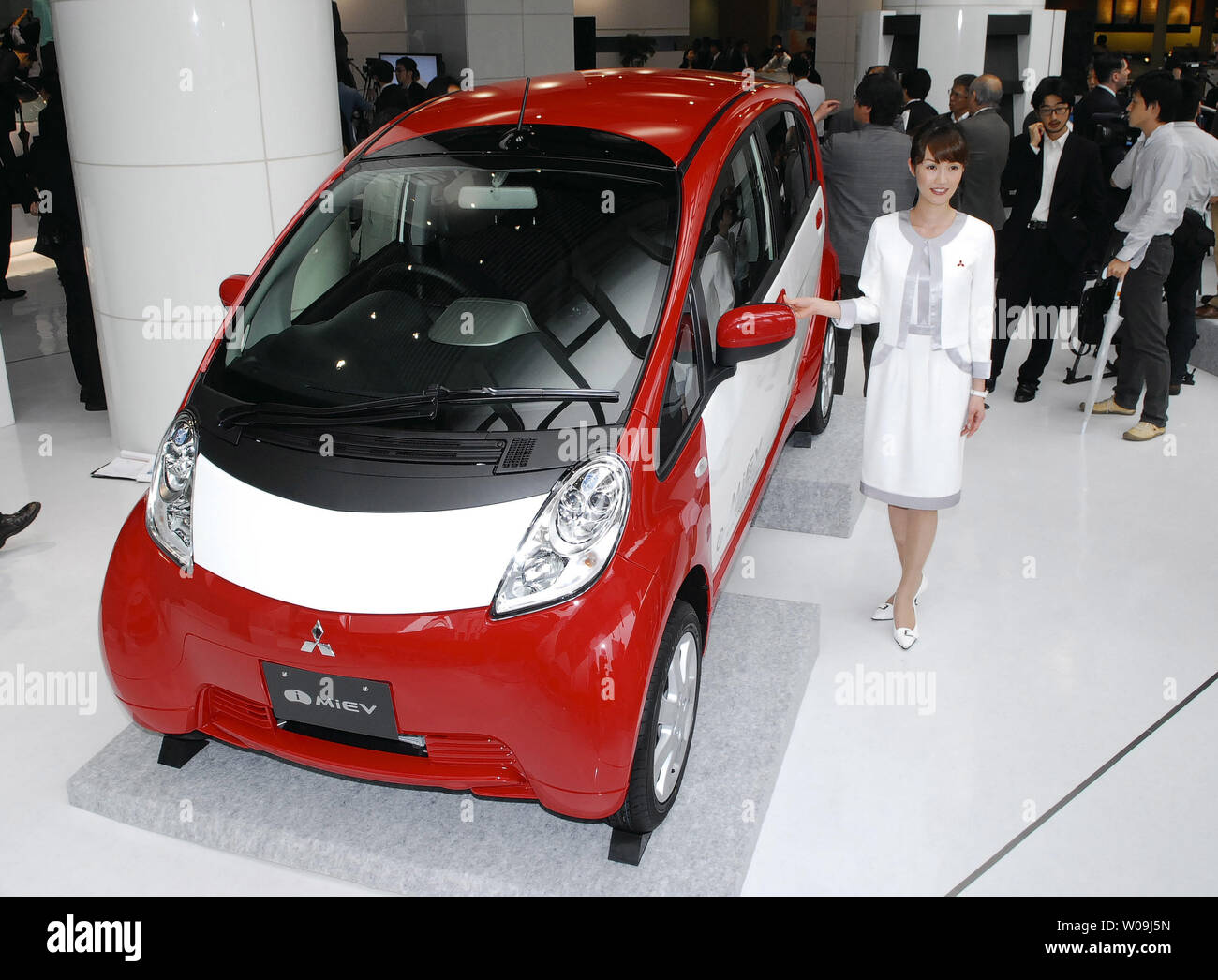 The "i-MiEV" is displayed during an unveiling at the Mitsubishi Motors ...