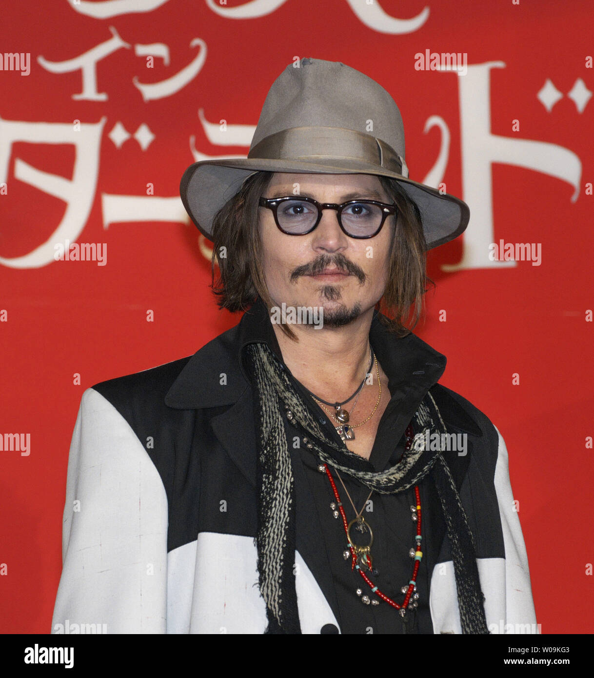 Actor Johnny Depp attends a photo call event for the premiere of the ...