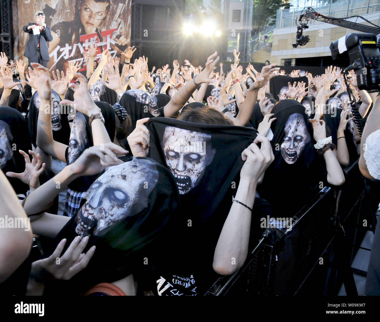 Japanese fans pose for camera during the world premiere for the film ...