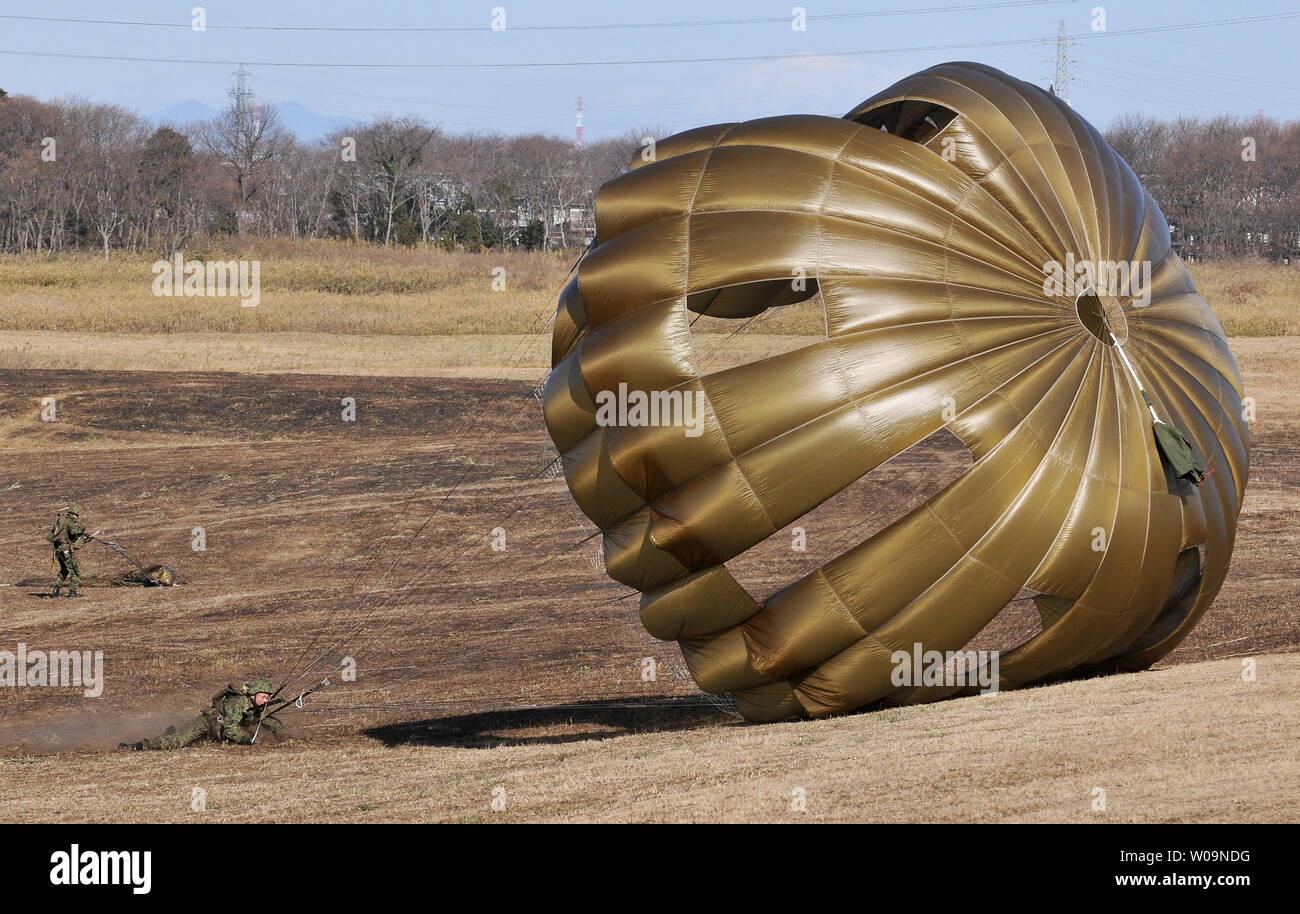 A members of Japan's Ground Self-Defense Force takes part in the new ...