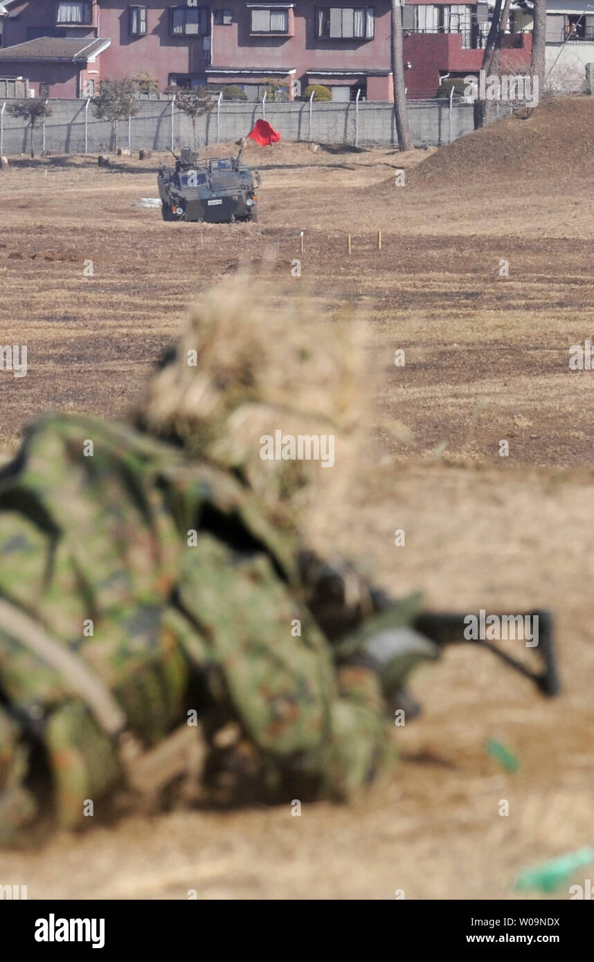 A members of Japan's Ground Self-Defense Force takes part in the new ...