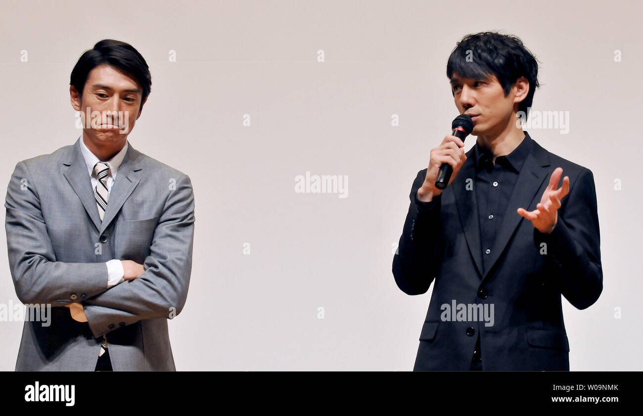 Japanese actor and director Yusuke Iseya (L) and actor Hidetoshi Nishijima attend a stage ...