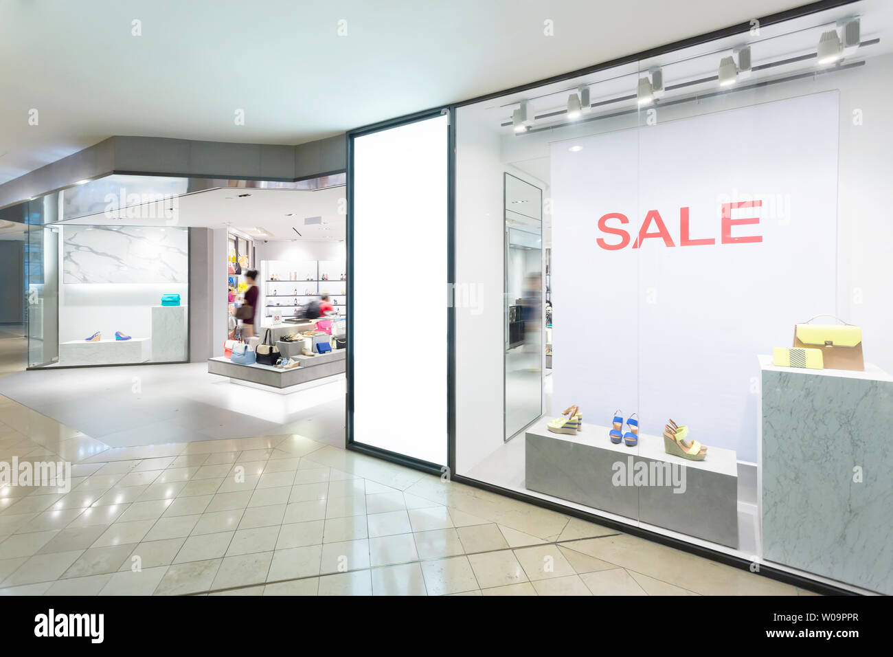 Shoes display in the store window Stock Photo - Alamy