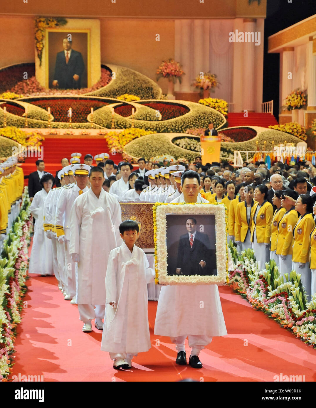 Family and relatives carry the coffin of the late Rev. Sun Myung Moon ...