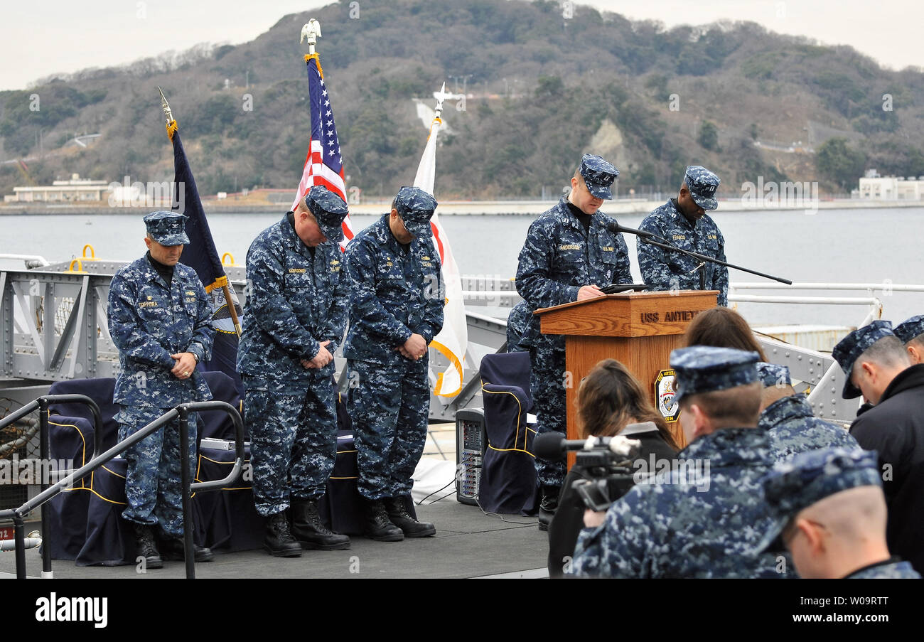 USS Cowpens' Capt. Robert P. Tortora(L), Rear Admiral Mark C ...