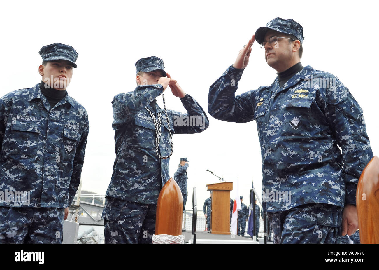 USS Antietam's Capt. Thomas C. Disy(R) walks during USS Cowpens and USS ...