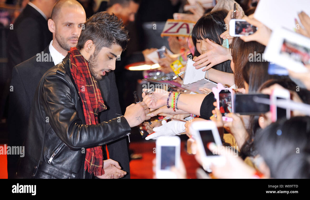 Zayn Malik of One Direction attends a stage greeting for the film "This ...