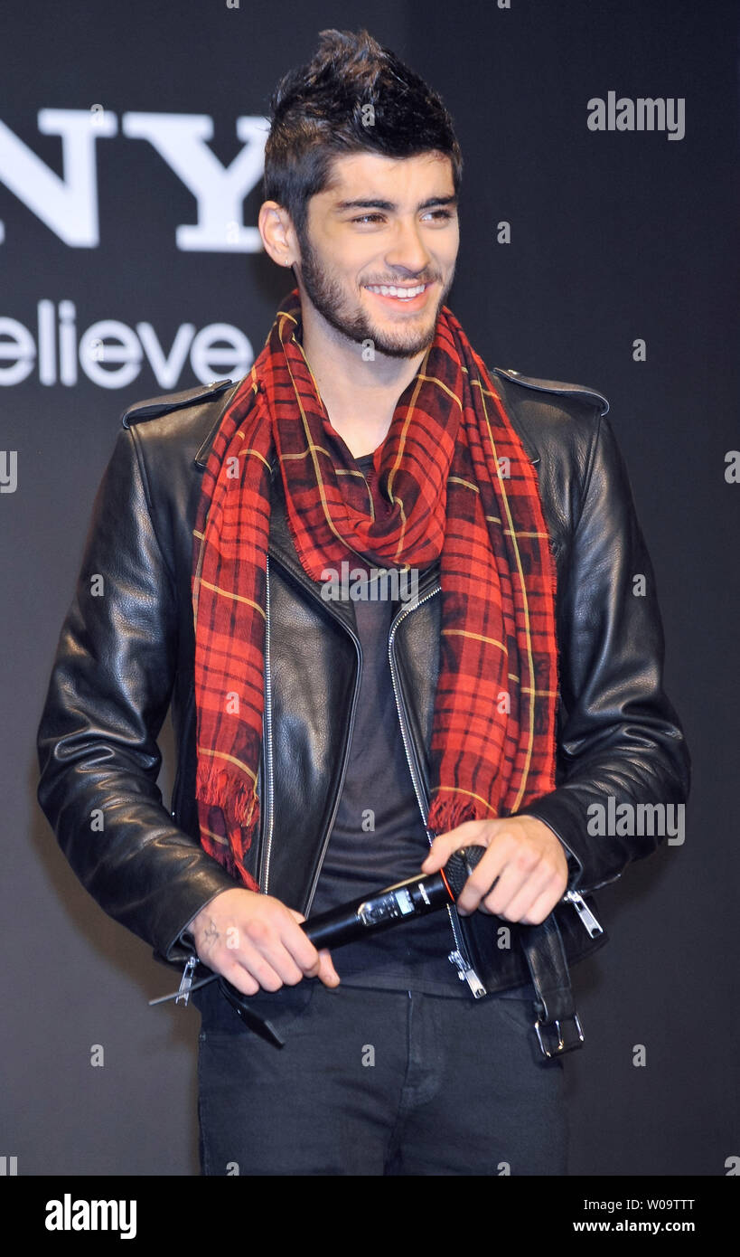 Zayn Malik of One Direction attends a stage greeting for the film "This ...