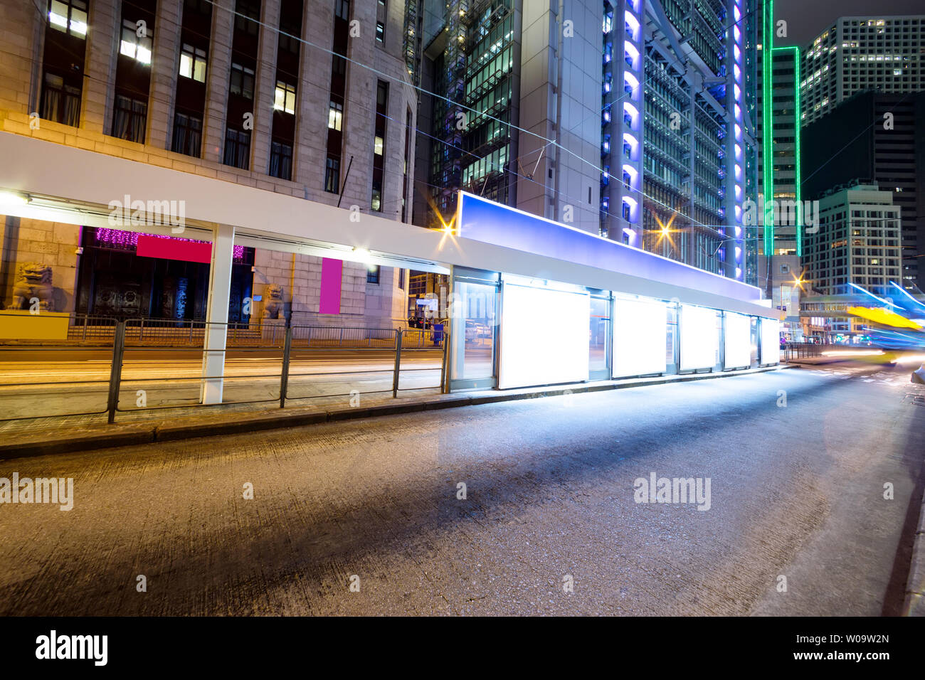 Traffic light trails bus stop Stock Photo - Alamy