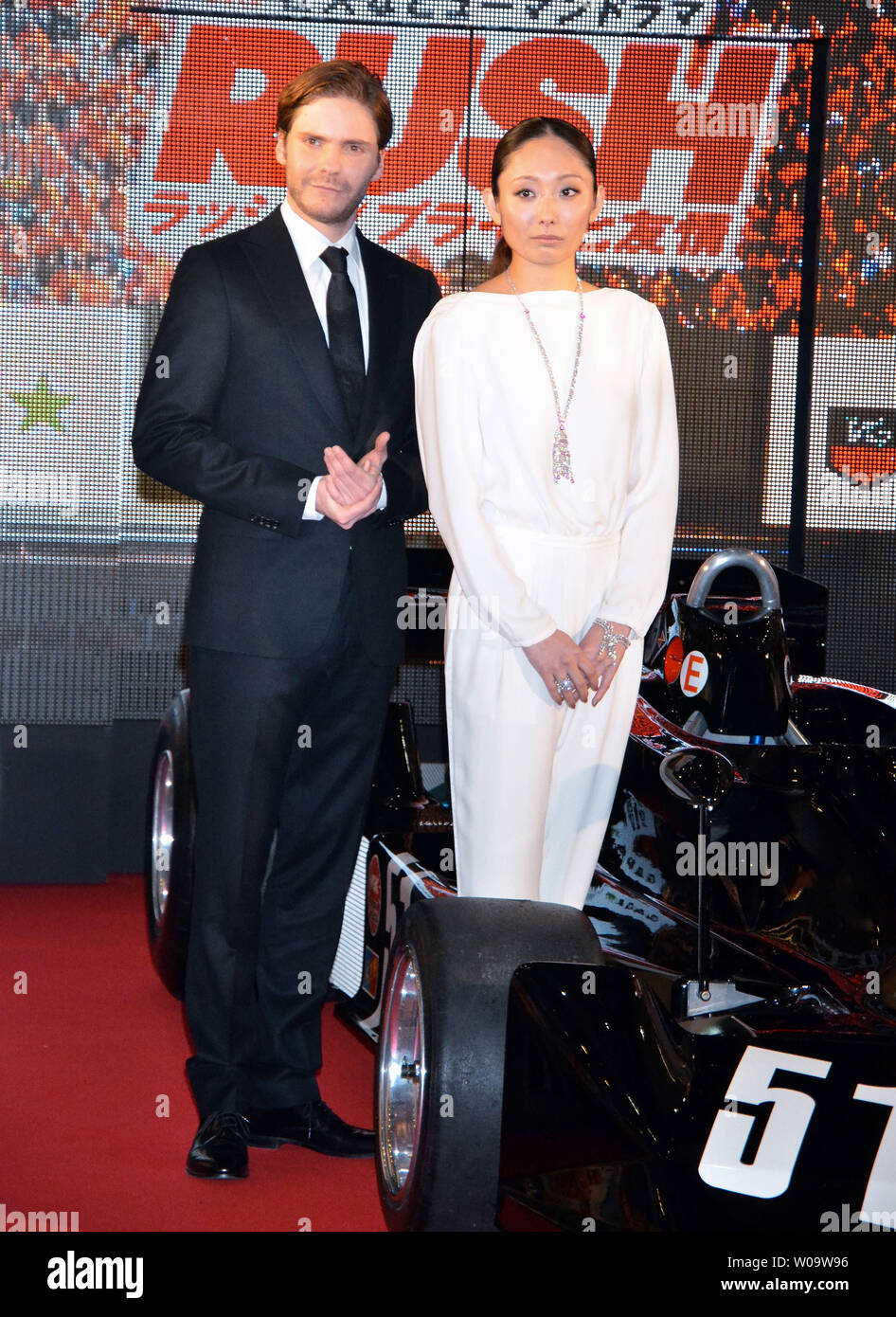 Actor Daniel Bruhl(L) and Japanese figure skater Miki Ando attend a ...