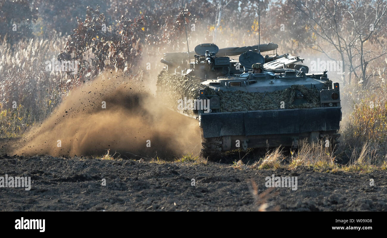 Japan's Type 73 armored vehicles take part with U.S. 2-2 stryker ...