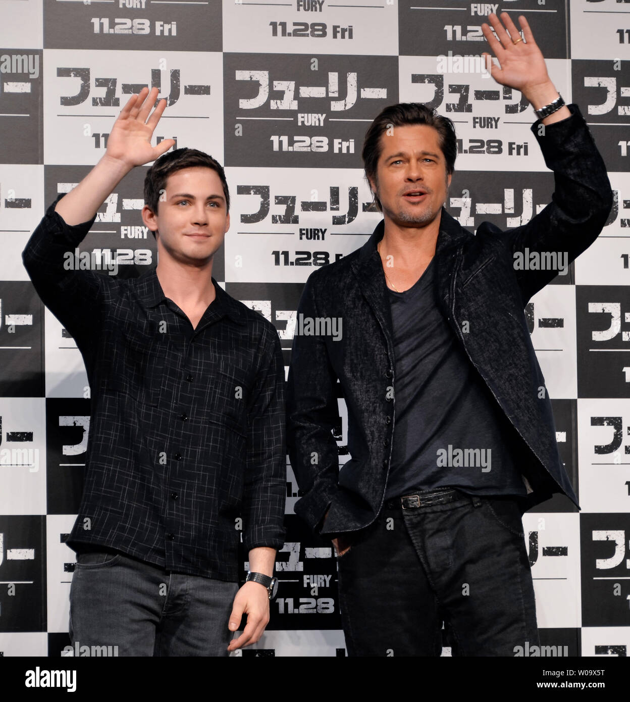 Actors Brad Pitt(R) and Logan Lerman attend a press conference for the ...