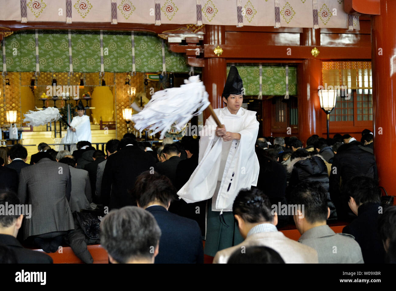 A Shinto priest performs the "Oharai" (ritual of purification) for ...