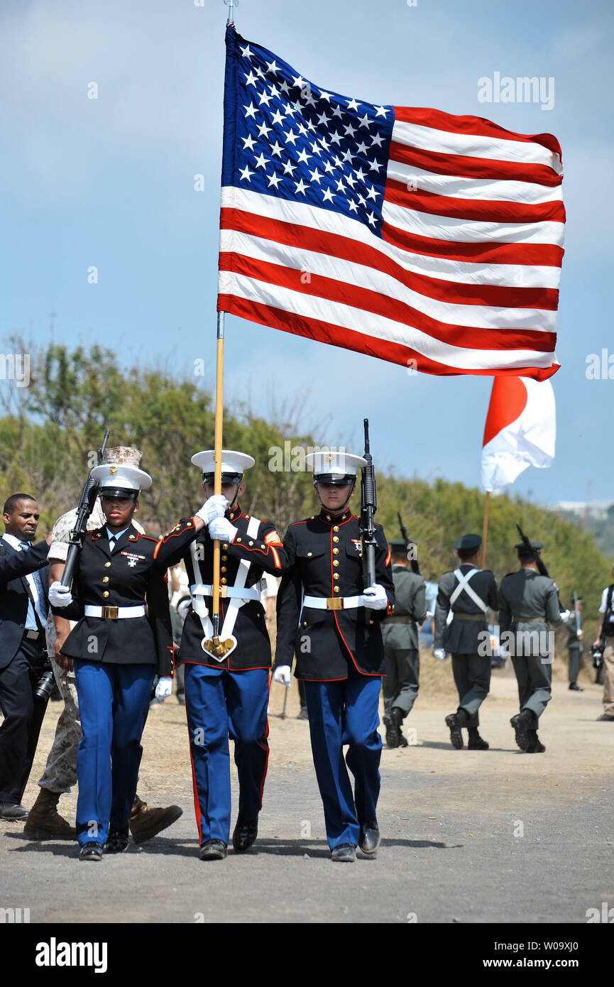 U.S. and Japanese color guards walk during the "Battle of Iwo Jima ...