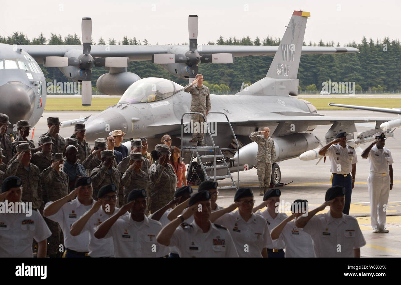 Member of U.S. Forces Japan salute a change of command ceremony at ...